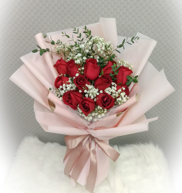 Red roses is always the right choice by Blooming Florist