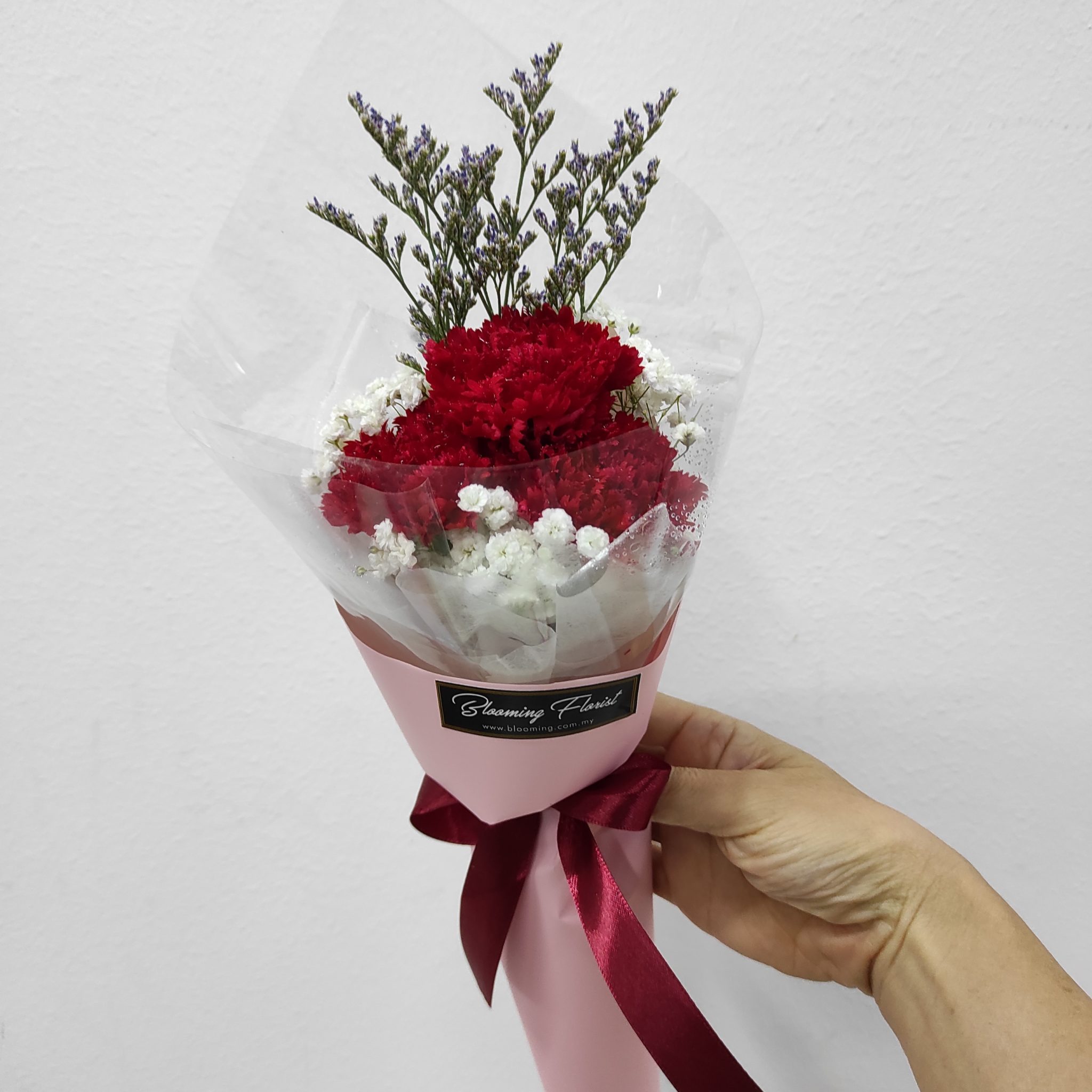 Looking for something small - Blooming. 3 Carnation Bouquet