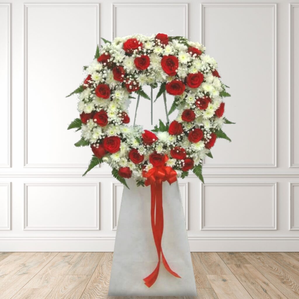 Buy Online Standing round wreath arrangement - Blooming