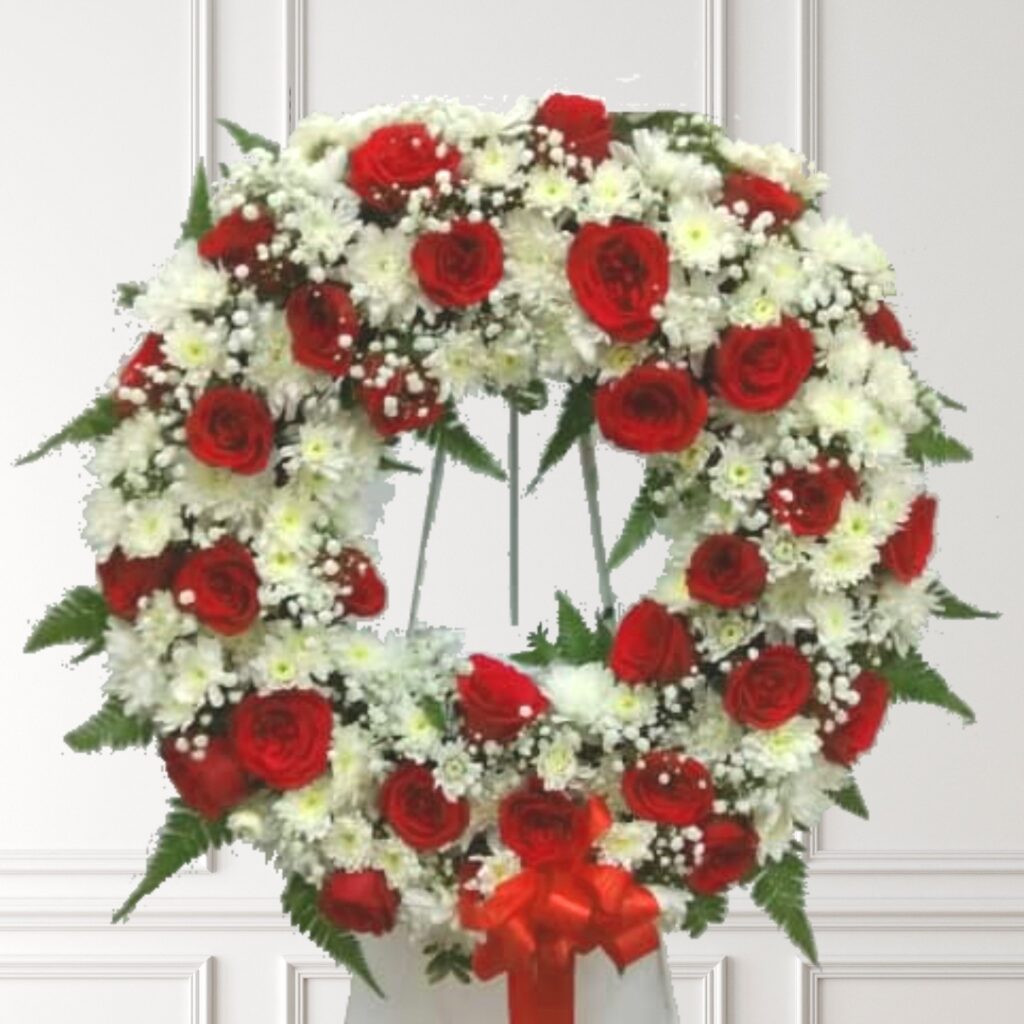 Buy Online Standing round wreath arrangement - Blooming