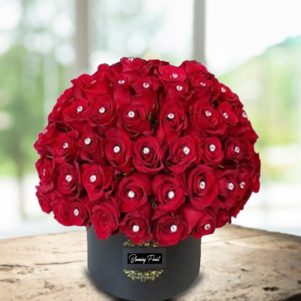 100 roses decorated with diamond pin arranged in a box - Blooming Florist