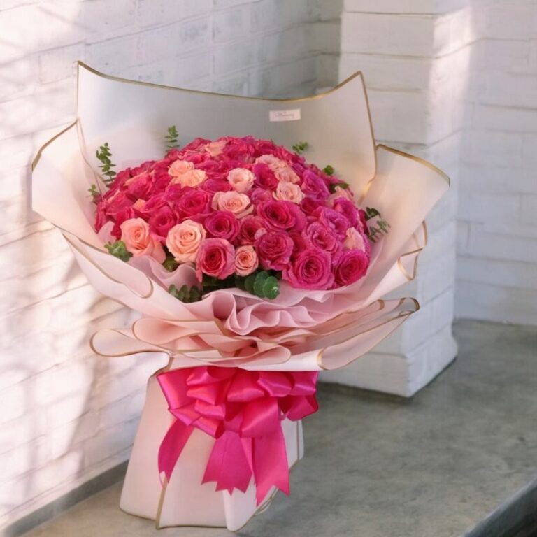 100 light and hot pink roses hand bouquet delivery by Blooming Florist